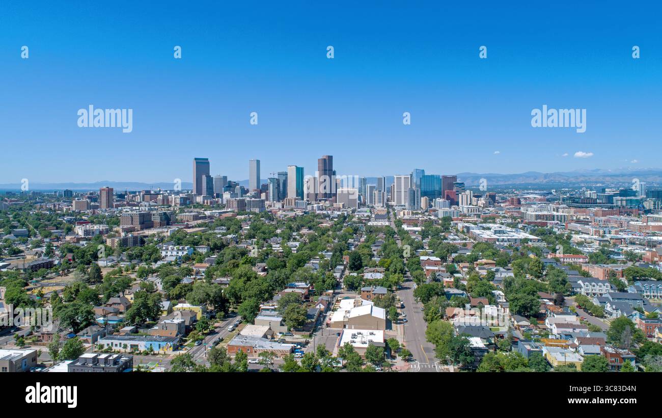 Aerial view of the Denver, Colorado skyline and the Rocky Mountains in ...