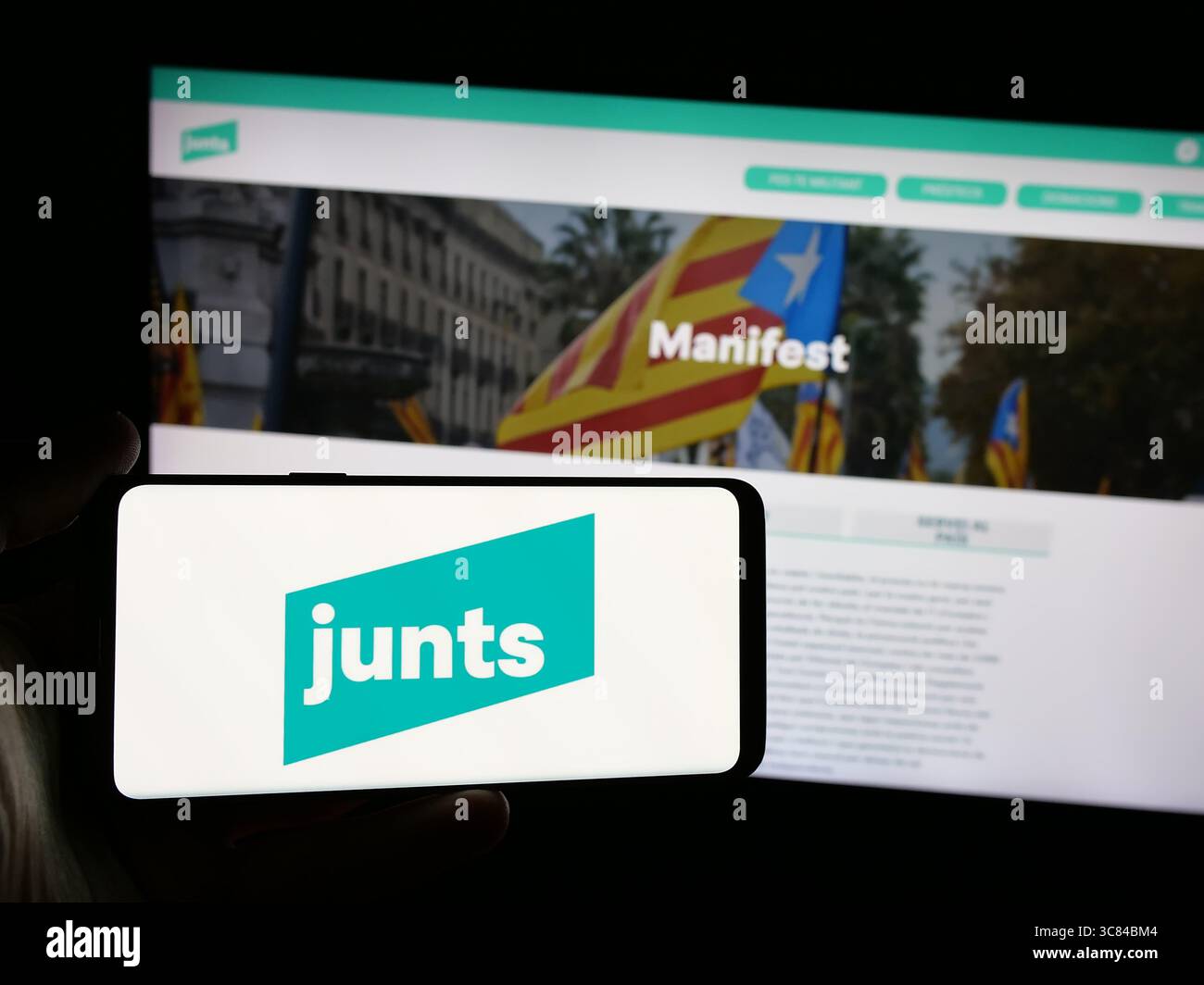 In this photo illustration, a person is holding a smartphone with the ...