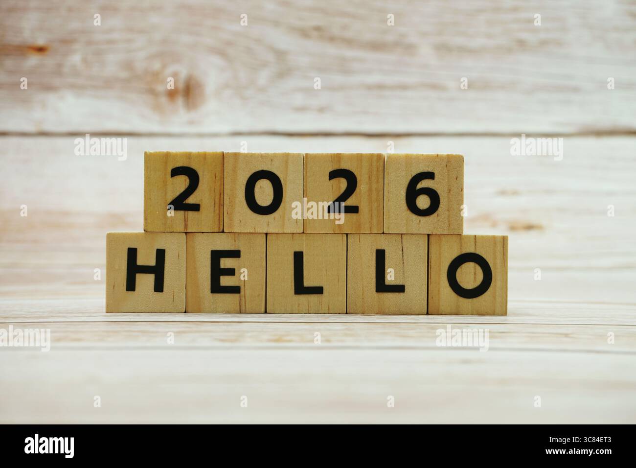 Hello 2026 alphabet letter on wooden background Stock Photo - Alamy