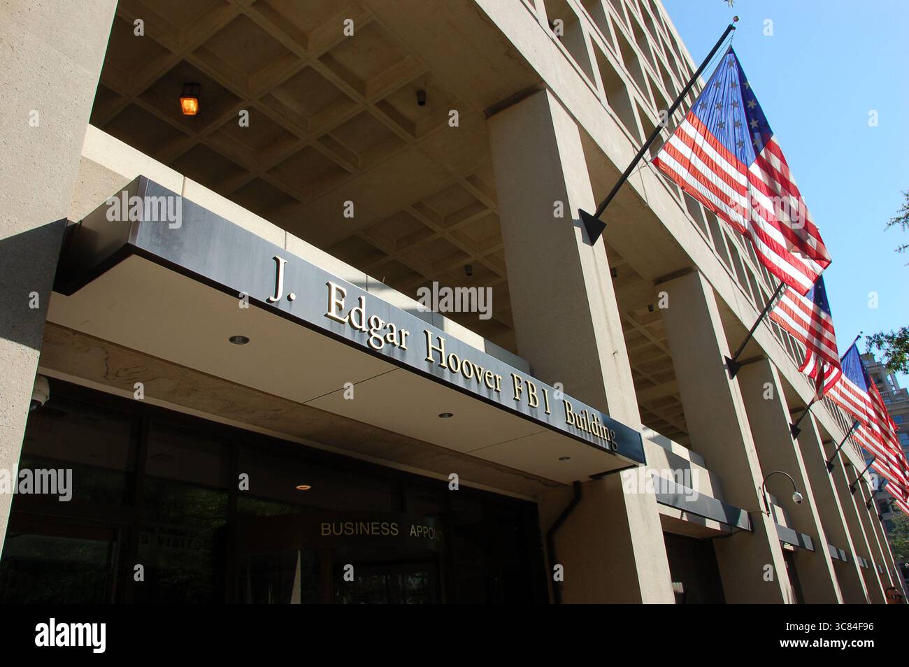 Row of American flags outside the J. Edgar Hoover Building, FBI ...