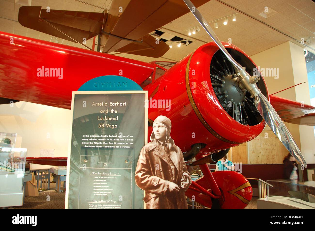 Exhibit of Amelia Earhart’s iconic red Lockheed 5B Vega aircraft at the ...