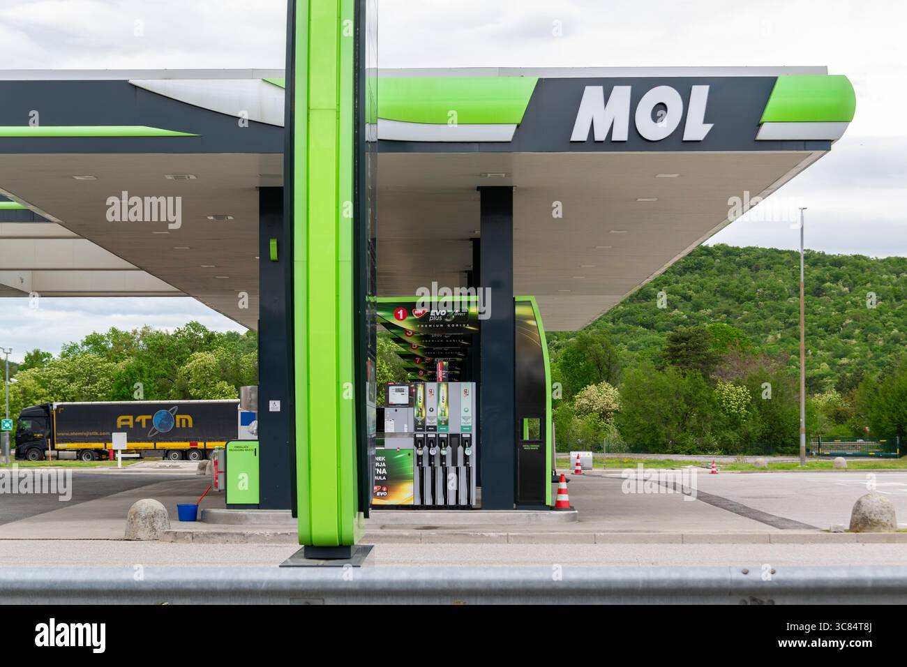 Kozina, Slovenia- 25.04.2025- Modern MOL gas station with fuel pumps on ...
