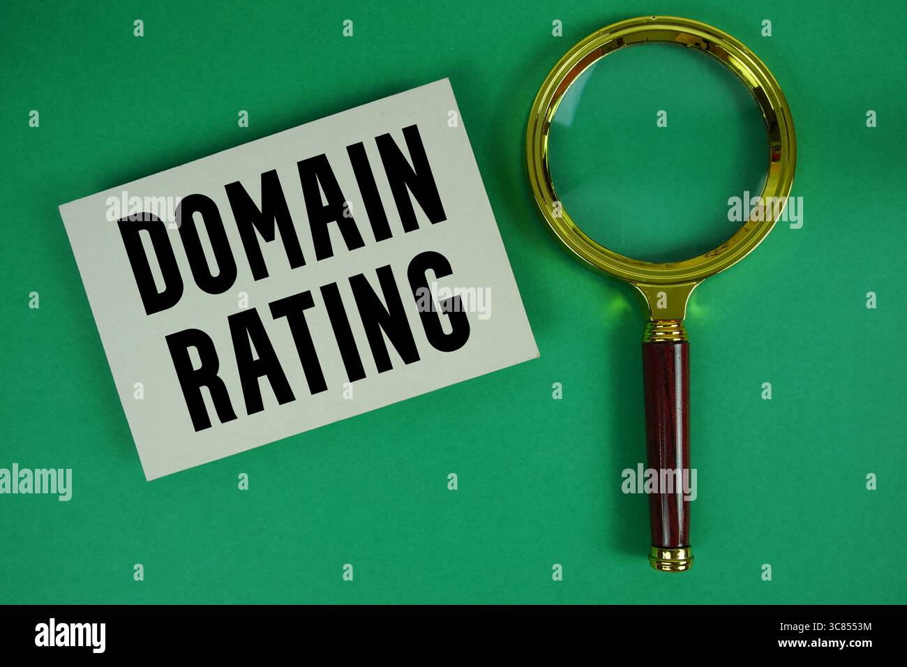Domain Rating text written on paper with magnifying glass Stock Photo ...