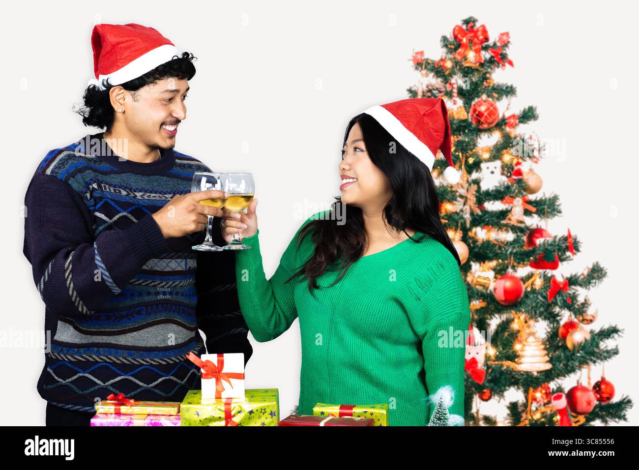 Happy Asian Couple Celebrating Christmas with Santa Claus Hat ...
