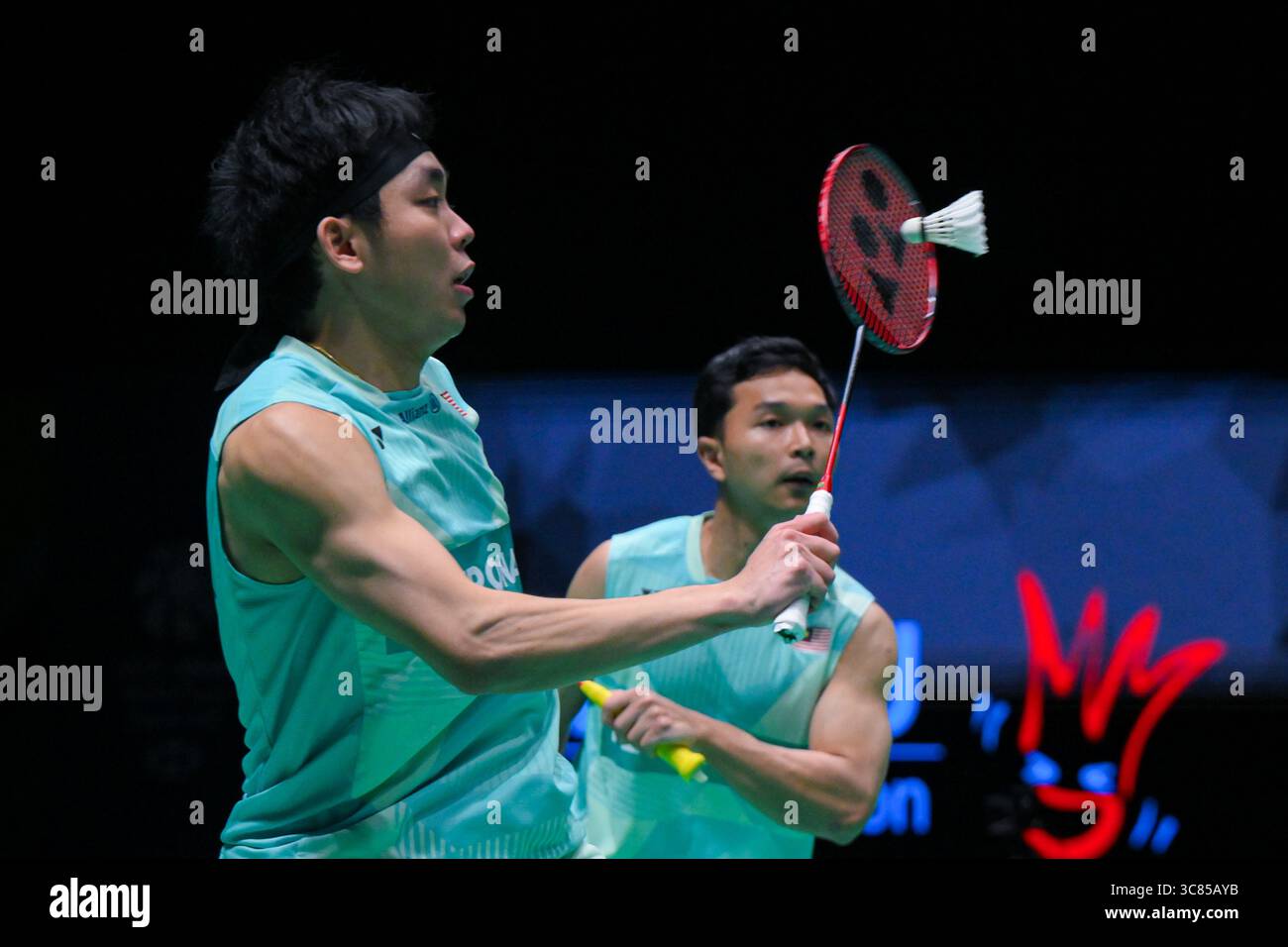 Macao, China. 3rd Aug, 2025. Junaidi Arif/Roy King Yap (L) compete ...