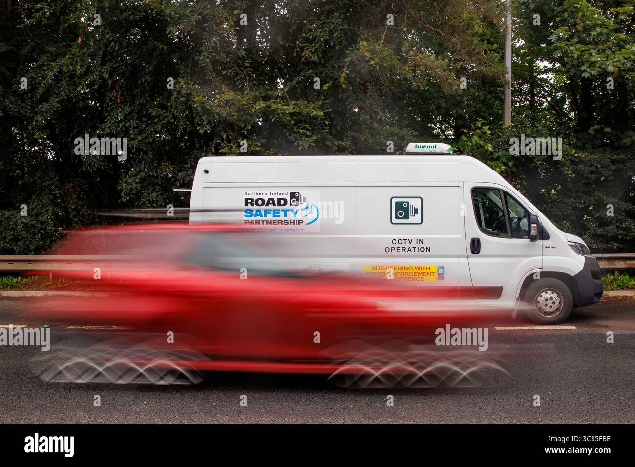 EMBARGOED TO 0001 MONDAY AUGUST 4 A slow-shutter image shows a car ...