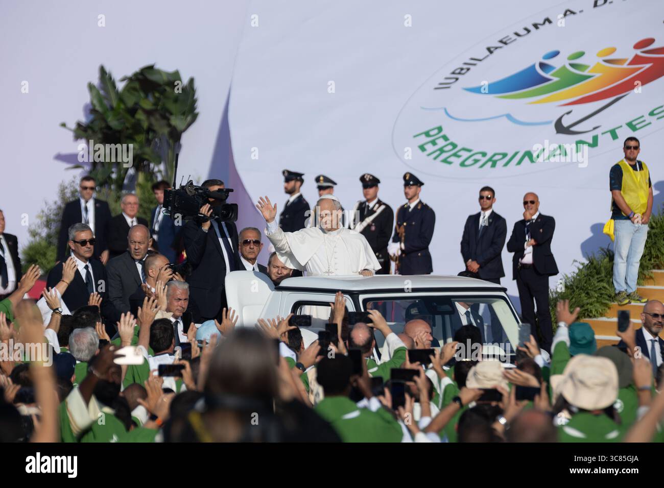 Pope Leo XIV greets young pilgrims during the closing Mass of the 2025 ...