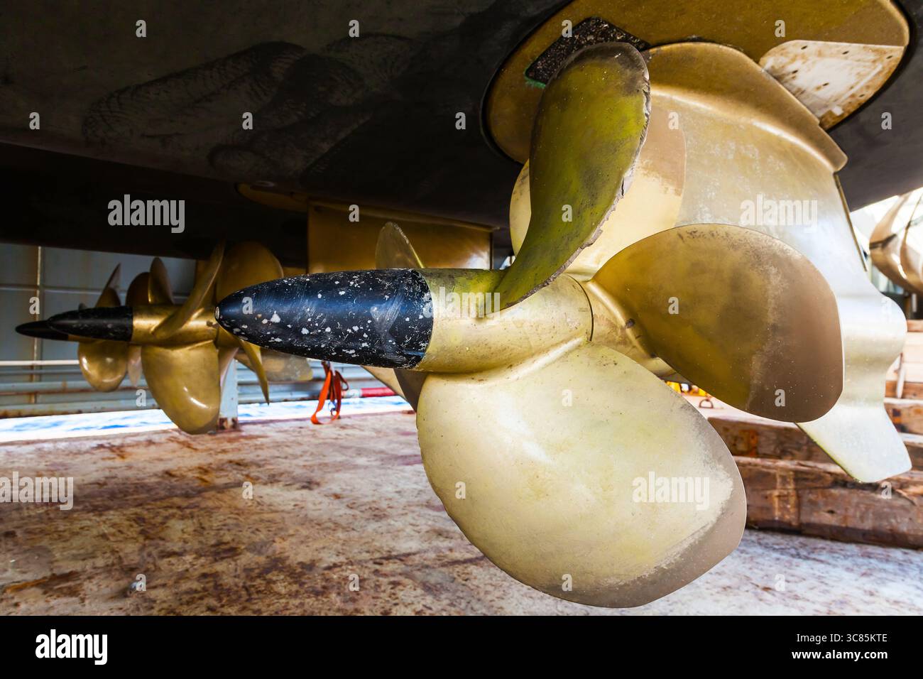 Bronze propellers on an expensive yacht. Three azimuthal thrusters at ...