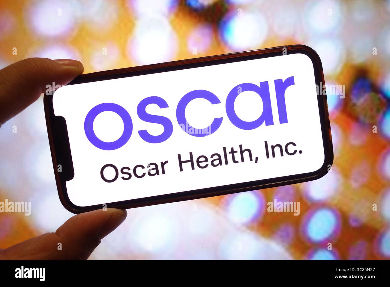 In this photo illustration, an Oscar Health company logo is seen ...
