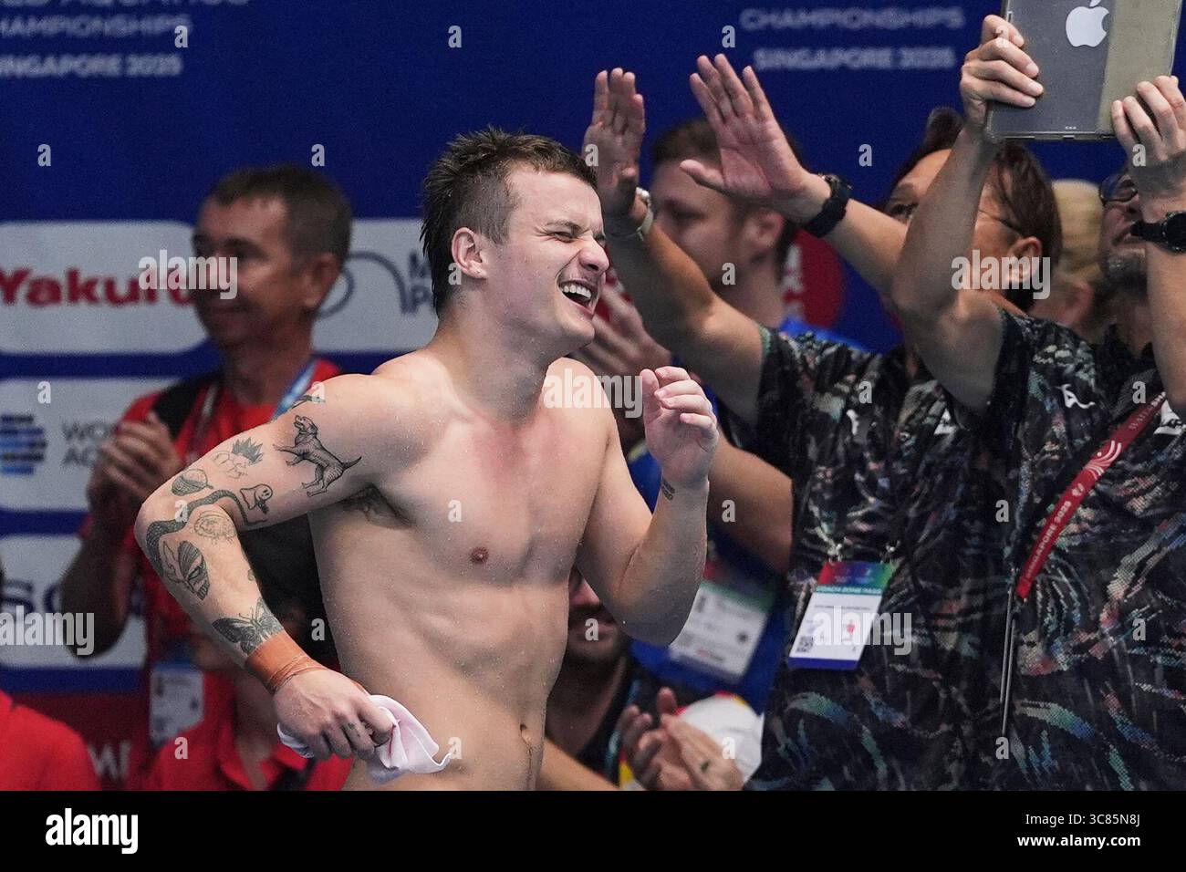 Cassiel Rousseau of Australia reacts after his final dive in the men's ...