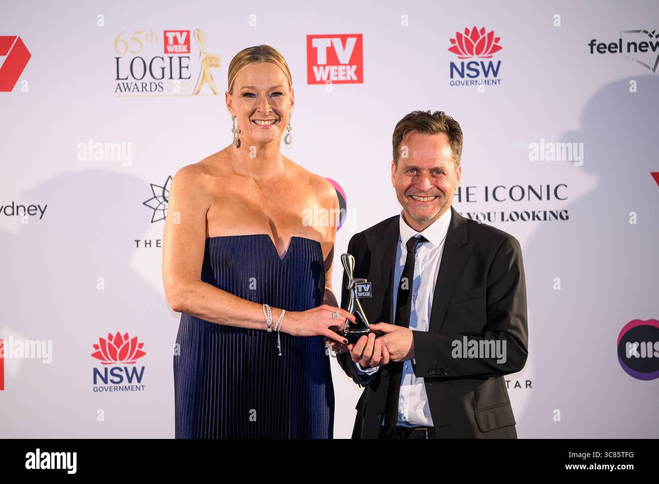 Leigh Sales (left) and Greg Hassall poses for a photograph after ...