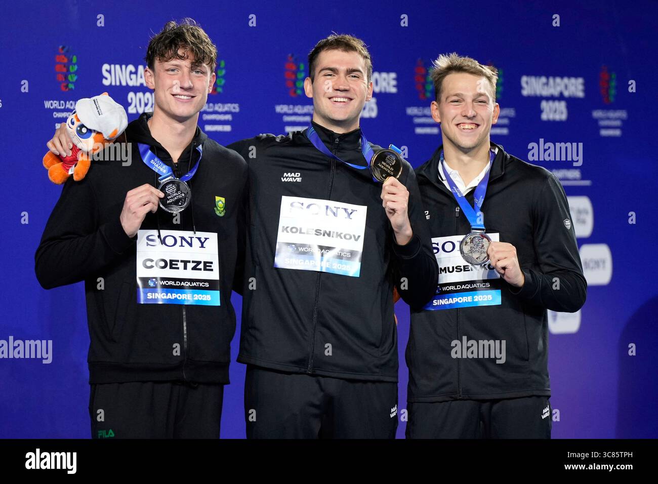 Gold medalist Neutral Athlete Russia, Kliment Kolesnikov, center ...