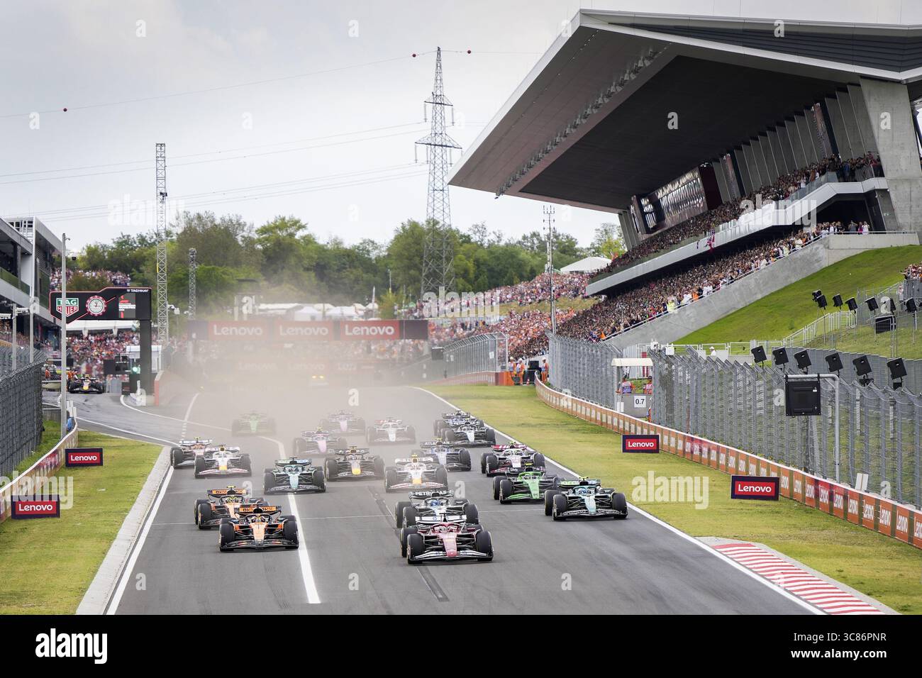 BOEDAPEST - Charles Leclerc (Ferrari) in the lead after the start, Max ...