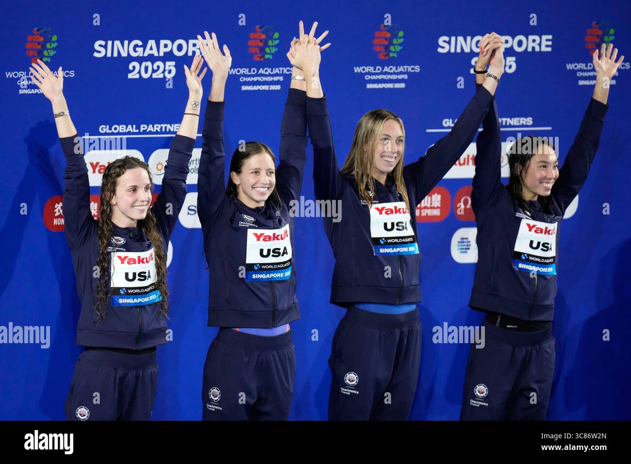 Gold medalists team United States pose on the podium after the women's ...
