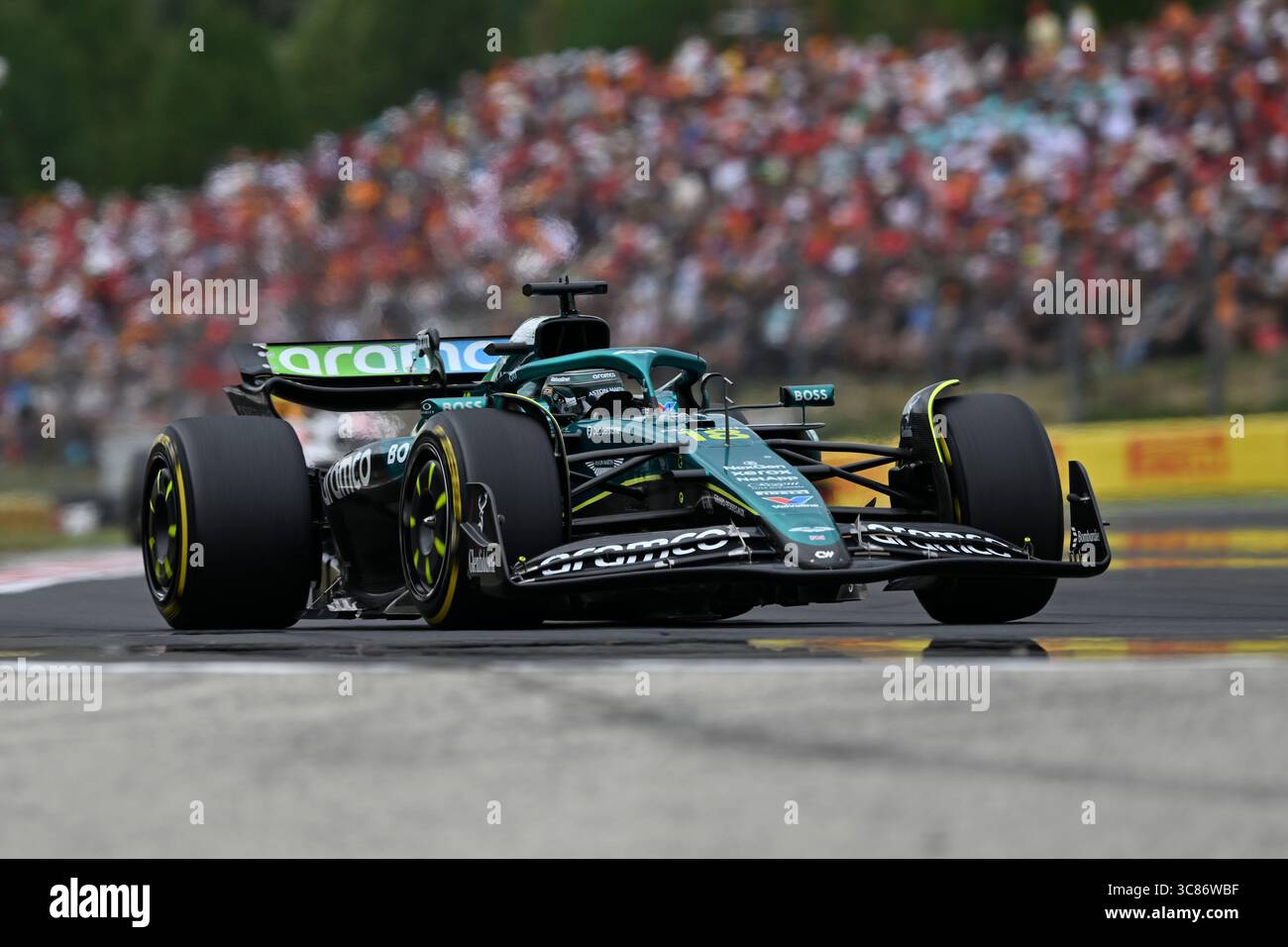 Aston Martin driver Lance Stroll of Canada steers his car during the ...