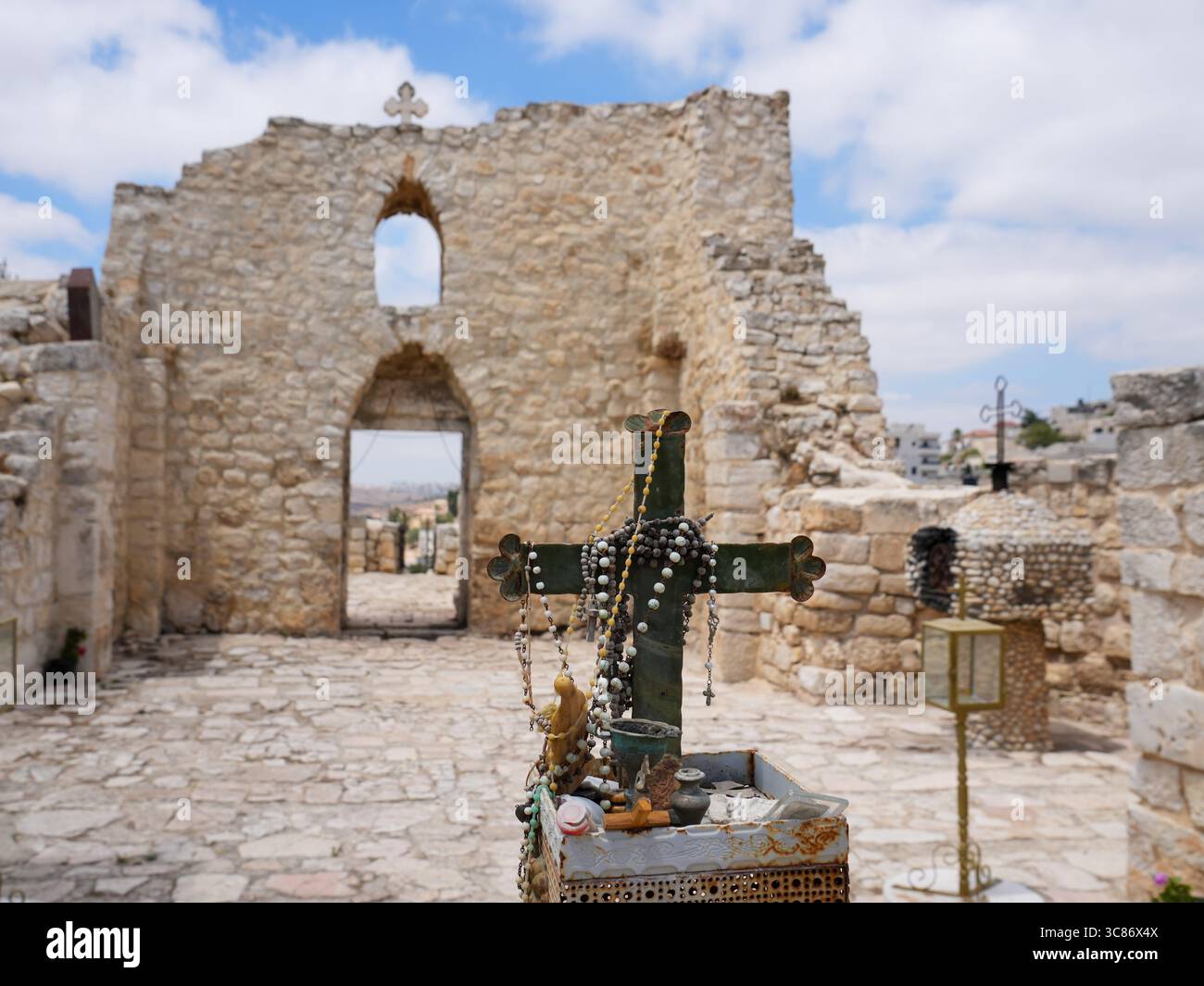 01 August 2025, Palestinian Territories, Taybeh: A cross with pearl ...