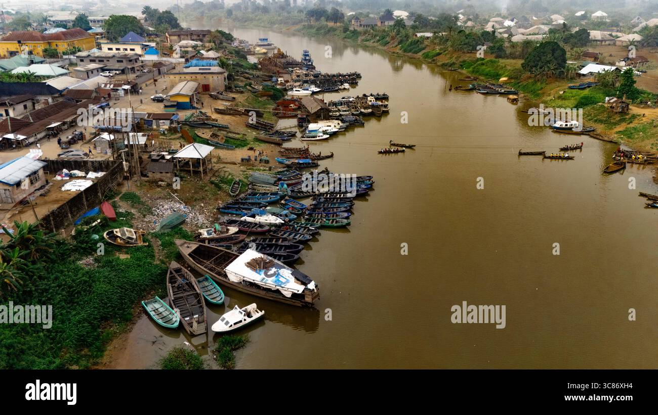 Lush greenery along muddy riverbank hi-res stock photography and images ...