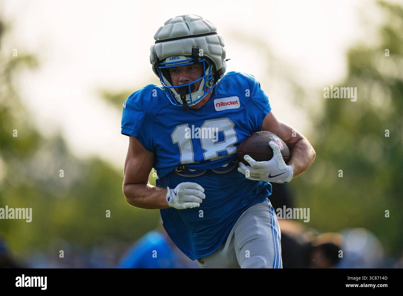 Detroit Lions wide receiver Isaac TeSlaa runs drills during NFL ...