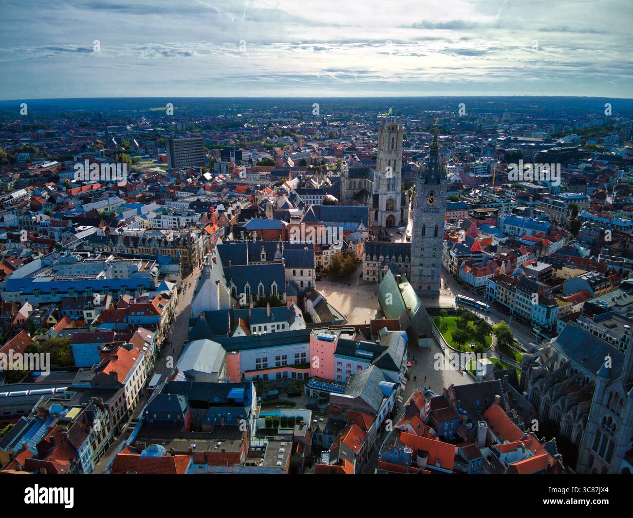 Aerial view of medieval architecture casting long shadows in the late ...