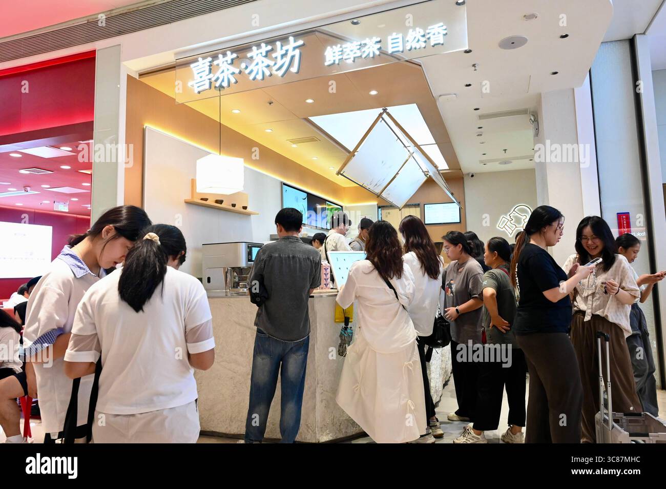 Shenzhen HEYTEA shop A general view showing people visit the HEYTEA ...
