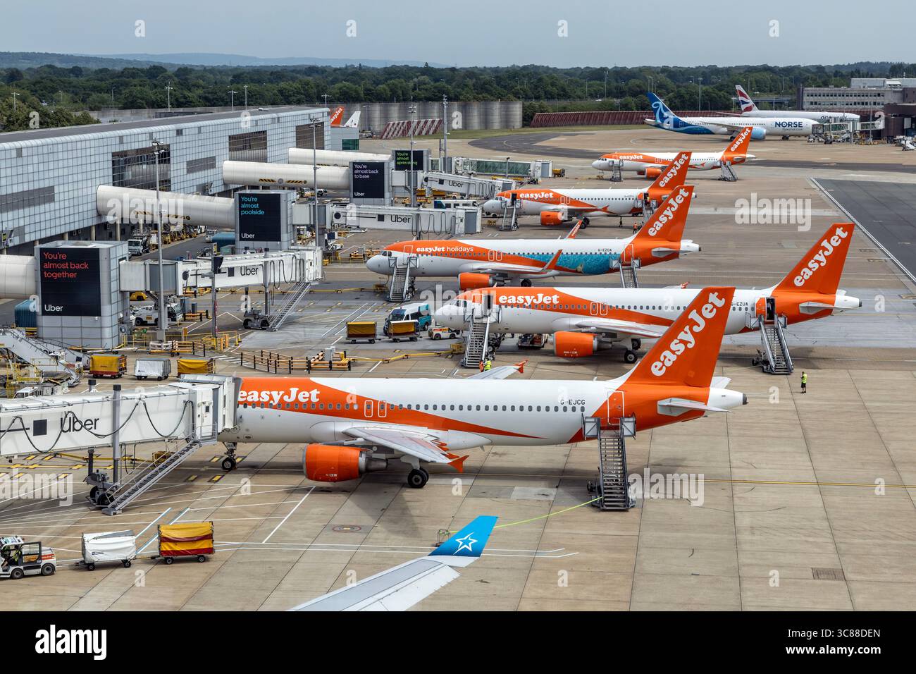 EasyJet Airbus airplanes at the Gatwick Airport North Terminal, England ...