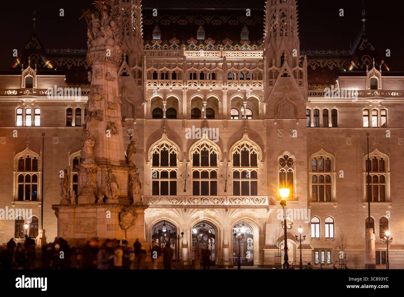 The illuminated Gothic facade of the Hungarian Ministry of the Interior ...