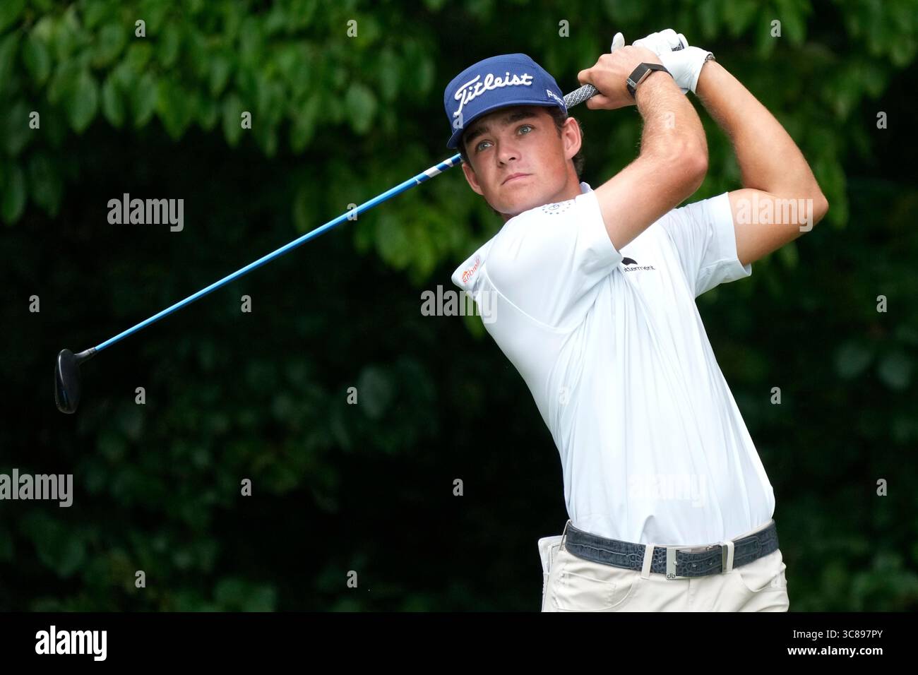 Jackson Koivun watches his tee shot on the second hole during the final round of the Wyndham ...