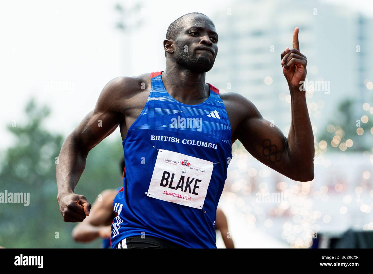 Jerome Blake celebrates winning the men's 200m senior finals during the ...
