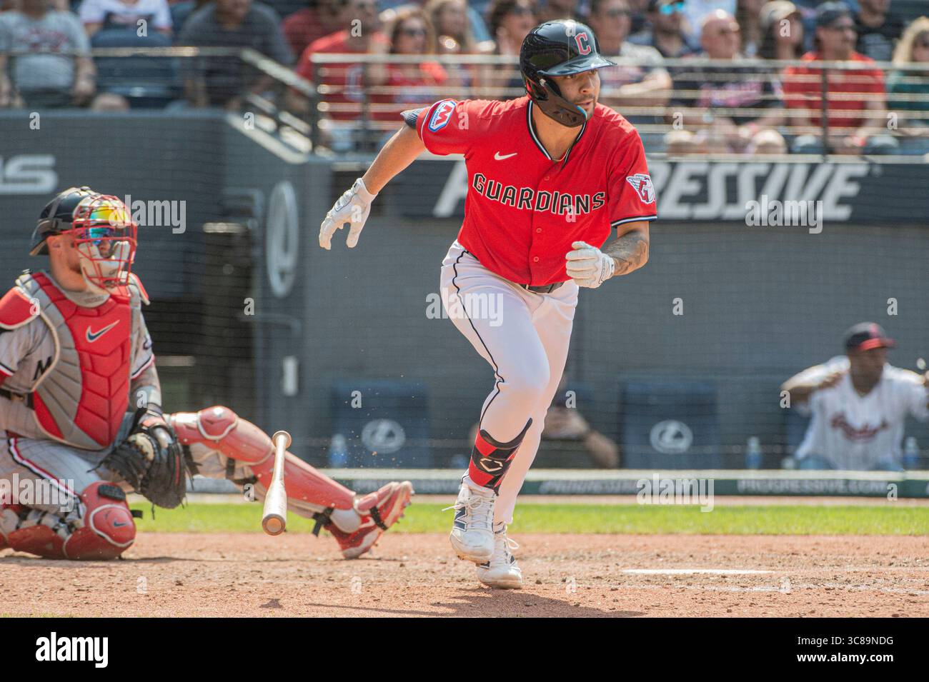 Cleveland Guardians' CJ Kayfus, right, watches his double off Minnesota ...