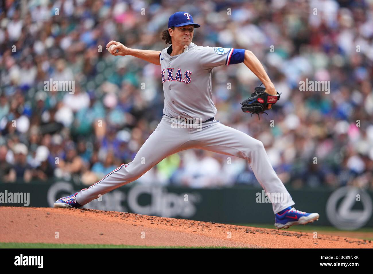 Texas Rangers starting pitcher Jacob deGrom throws against the Seattle ...