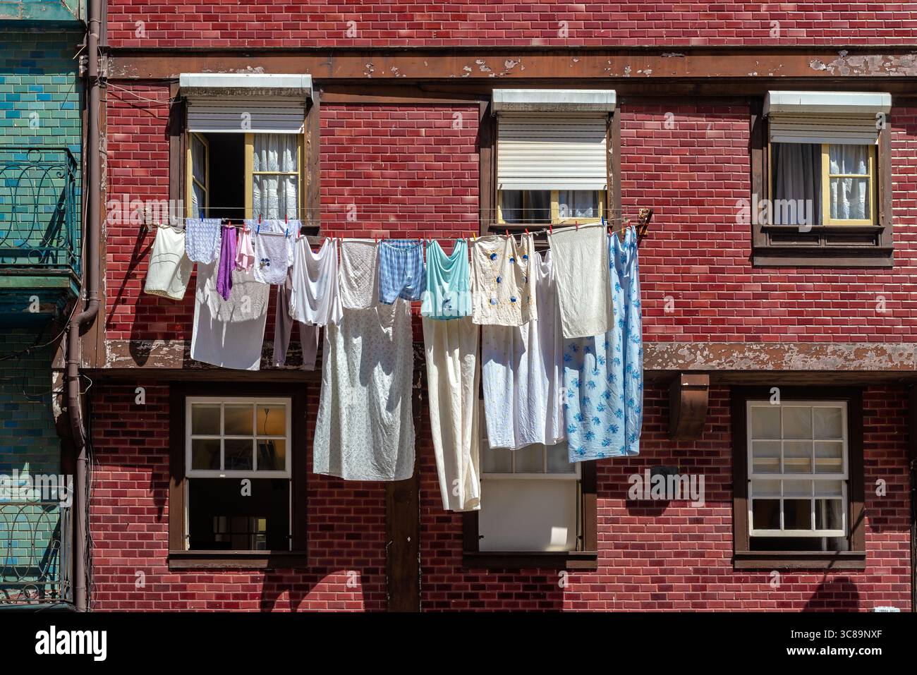 Drying clothes using sunlight hi-res stock photography and images - Alamy
