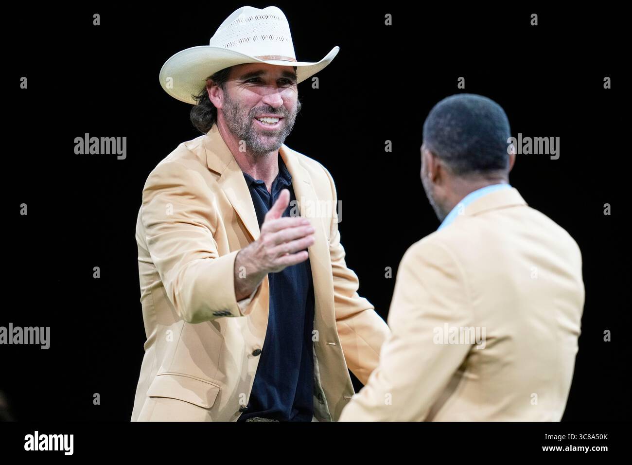 Jared Allen, left, member of the Pro Football Hall of Fame class of ...