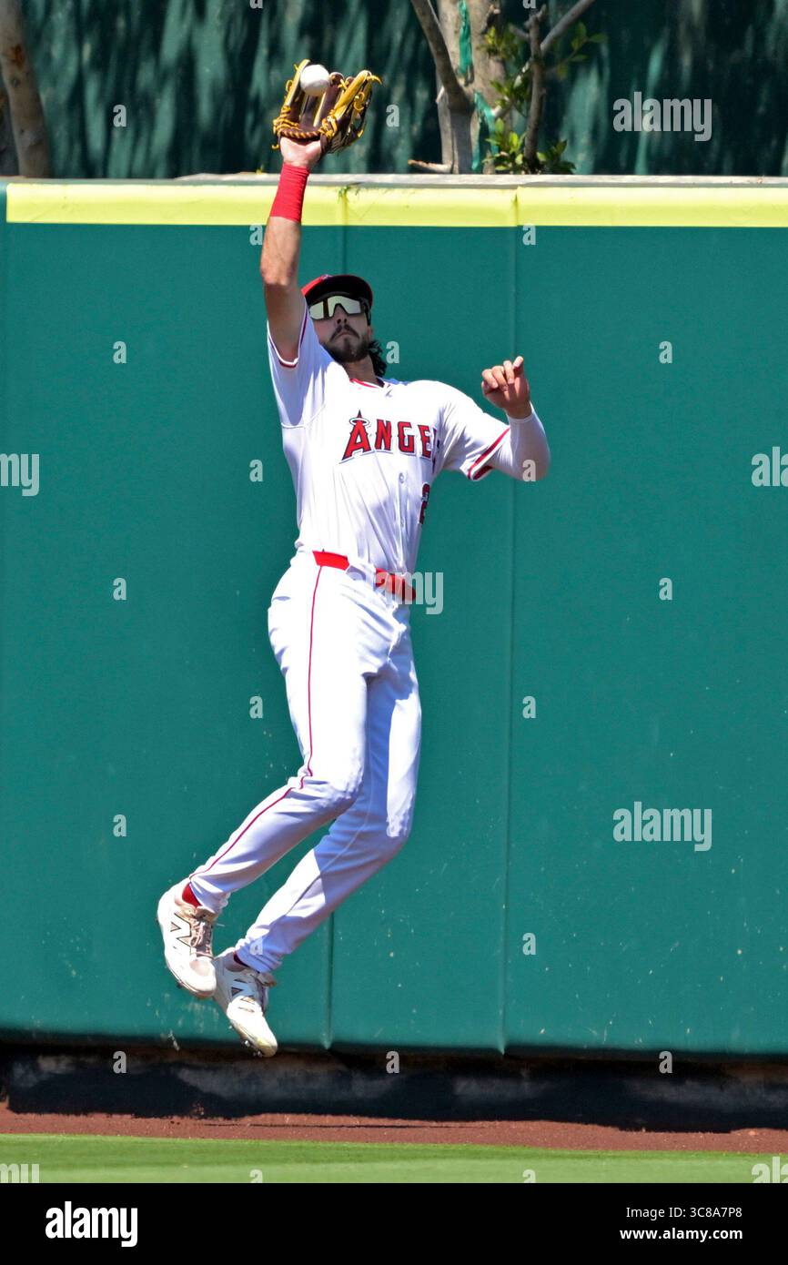 Los Angeles Angeles center fielder Bryce Teodosio makes a leaping catch ...