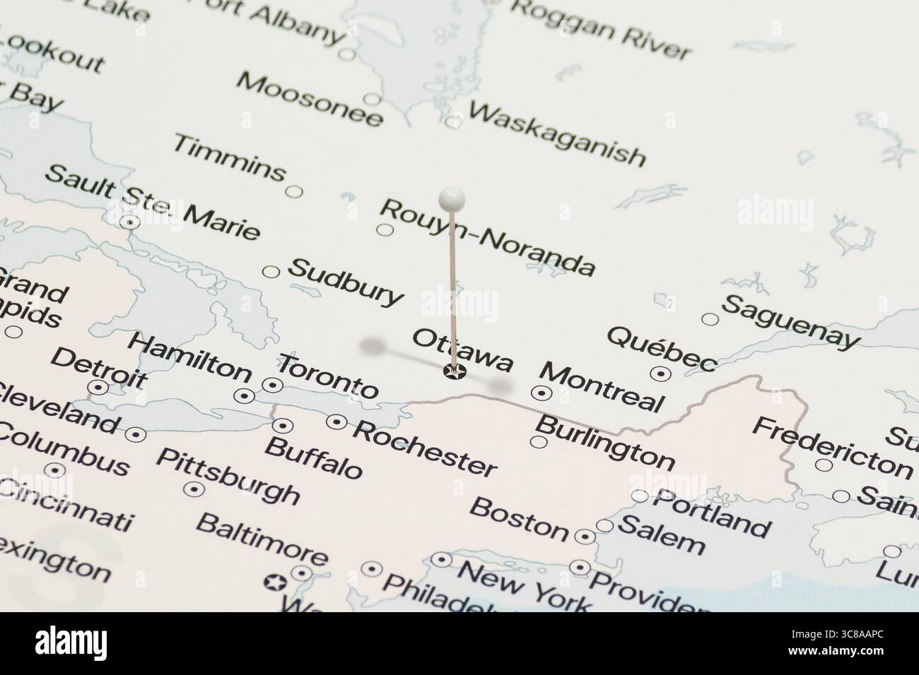 macro photo of a white pin needle into Ottawa city of Canada political ...
