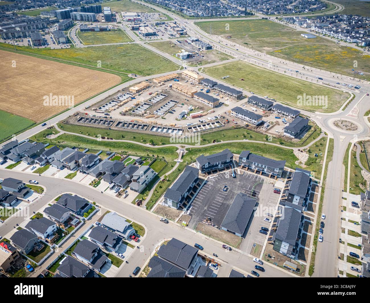 Residential area with a mix of houses and apartments. The houses are ...