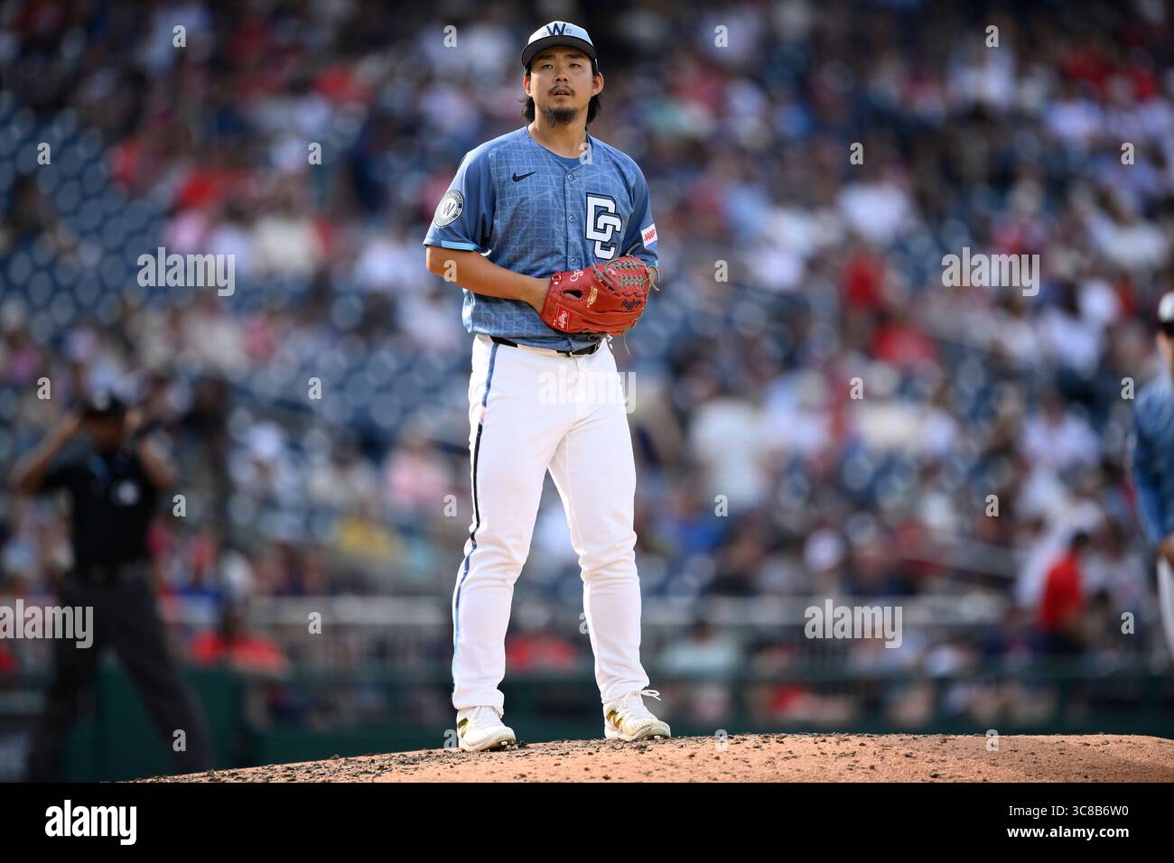 Washington Nationals relief pitcher Shinnosuke Ogasawara in action ...