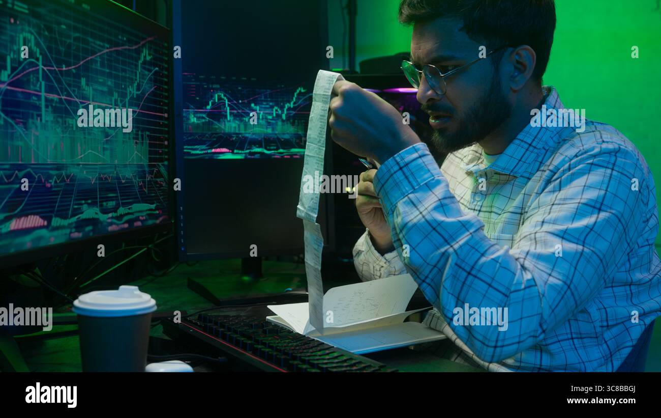 Arabian Indian man male guy programmer examining writing binary code coder freelancer engineer ...