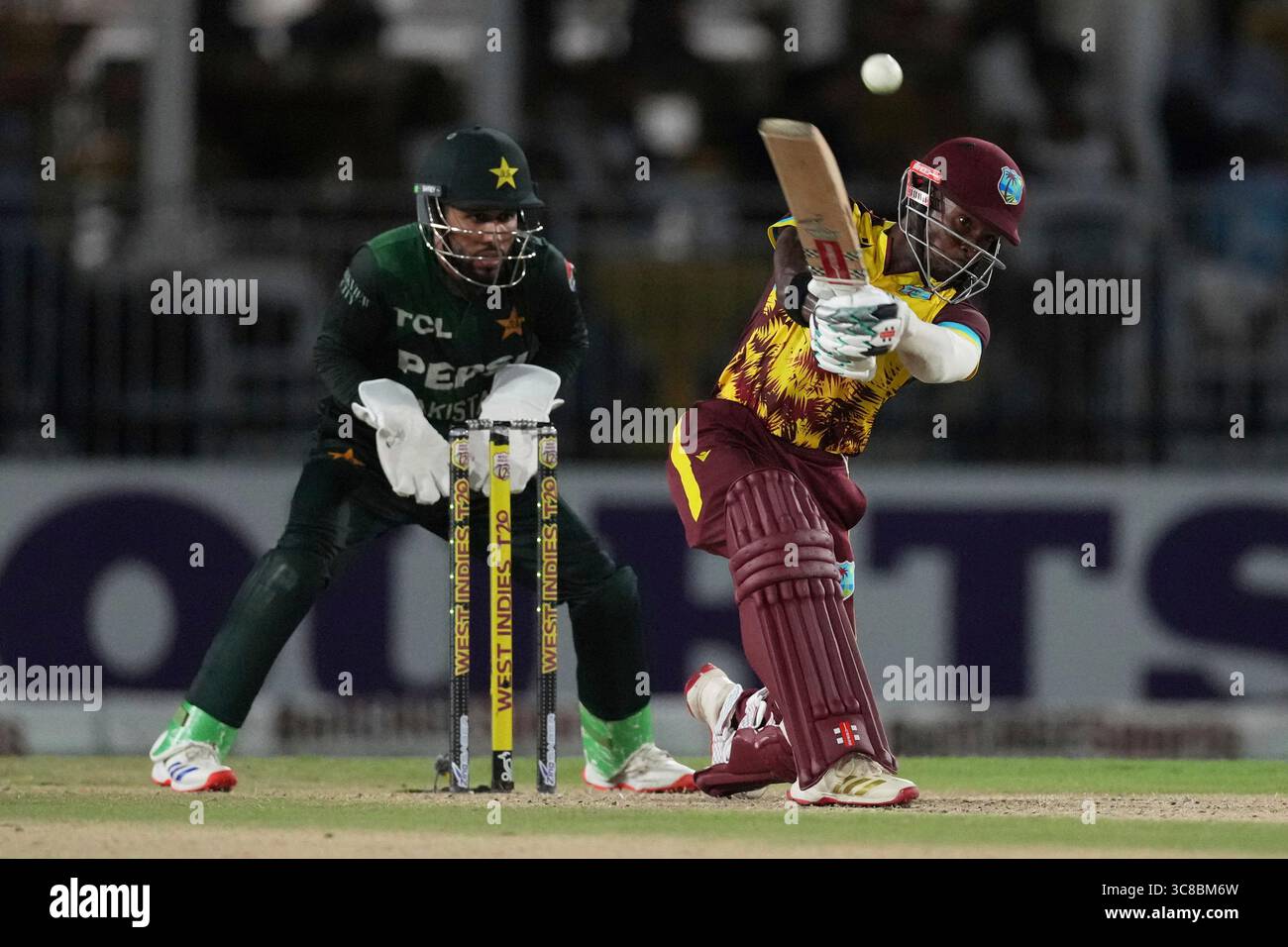 West Indies' Alick Athanaze, right, hits a four during the third ...