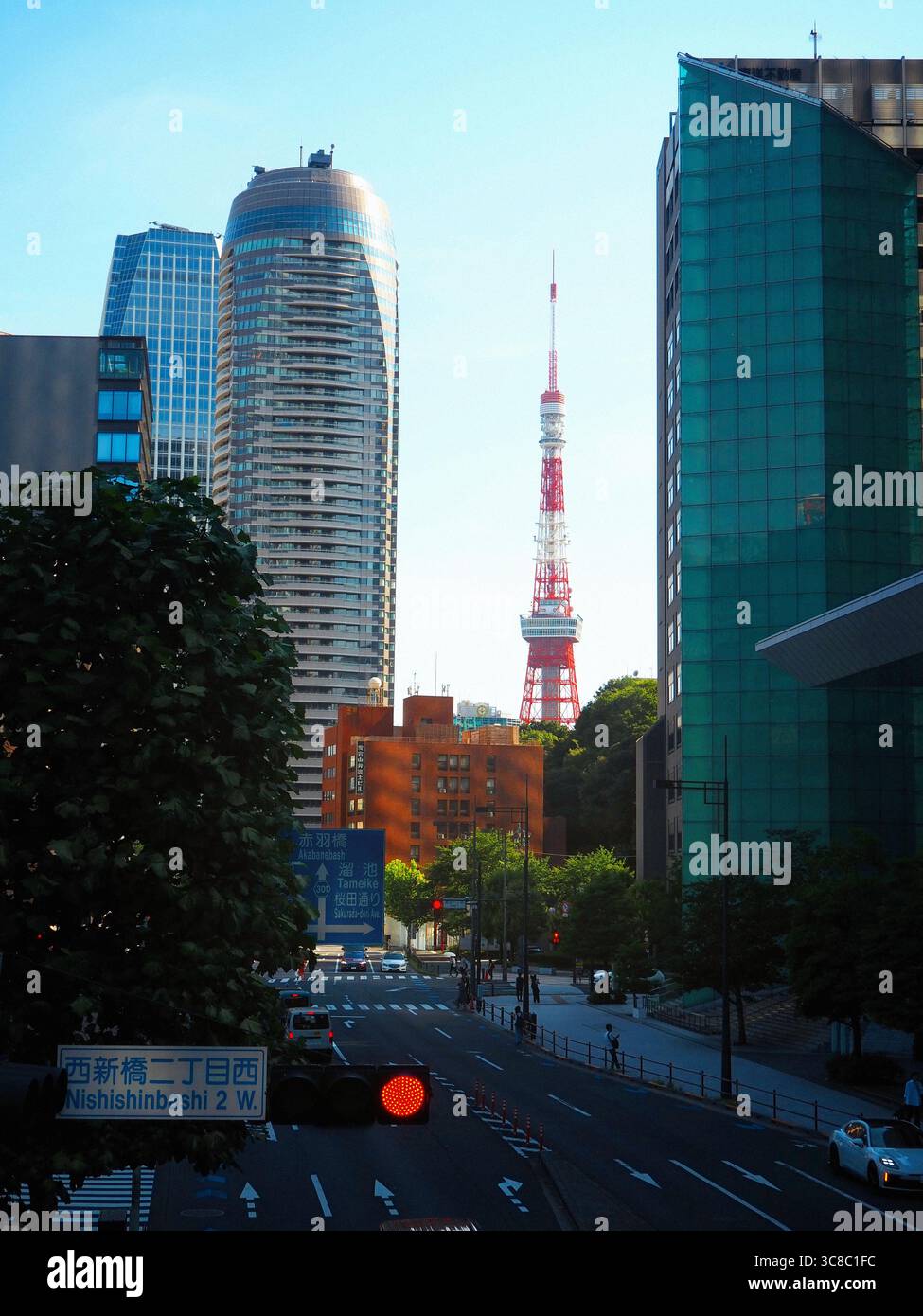 Tokyo Tower view from Toranomon with modern cityscape and skyscrapers ...