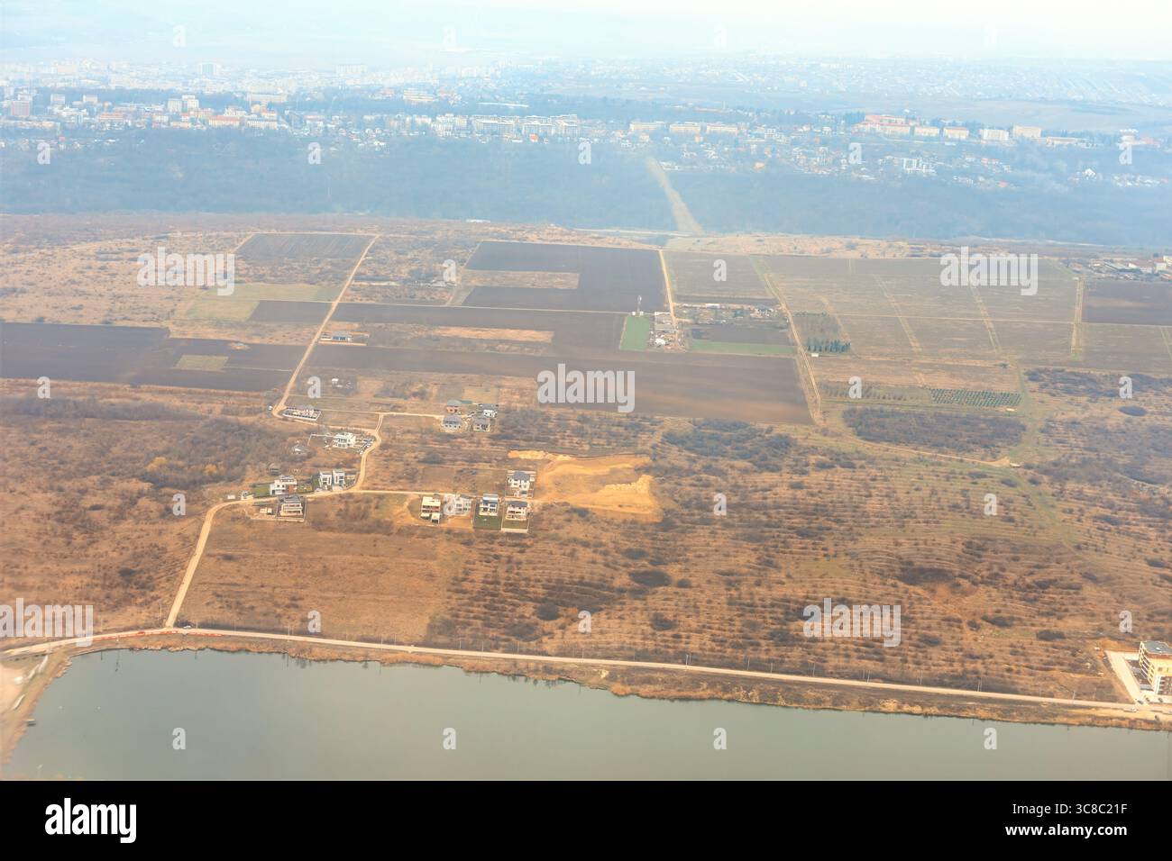 River forms a natural boundary, separating the cultivated fields and ...