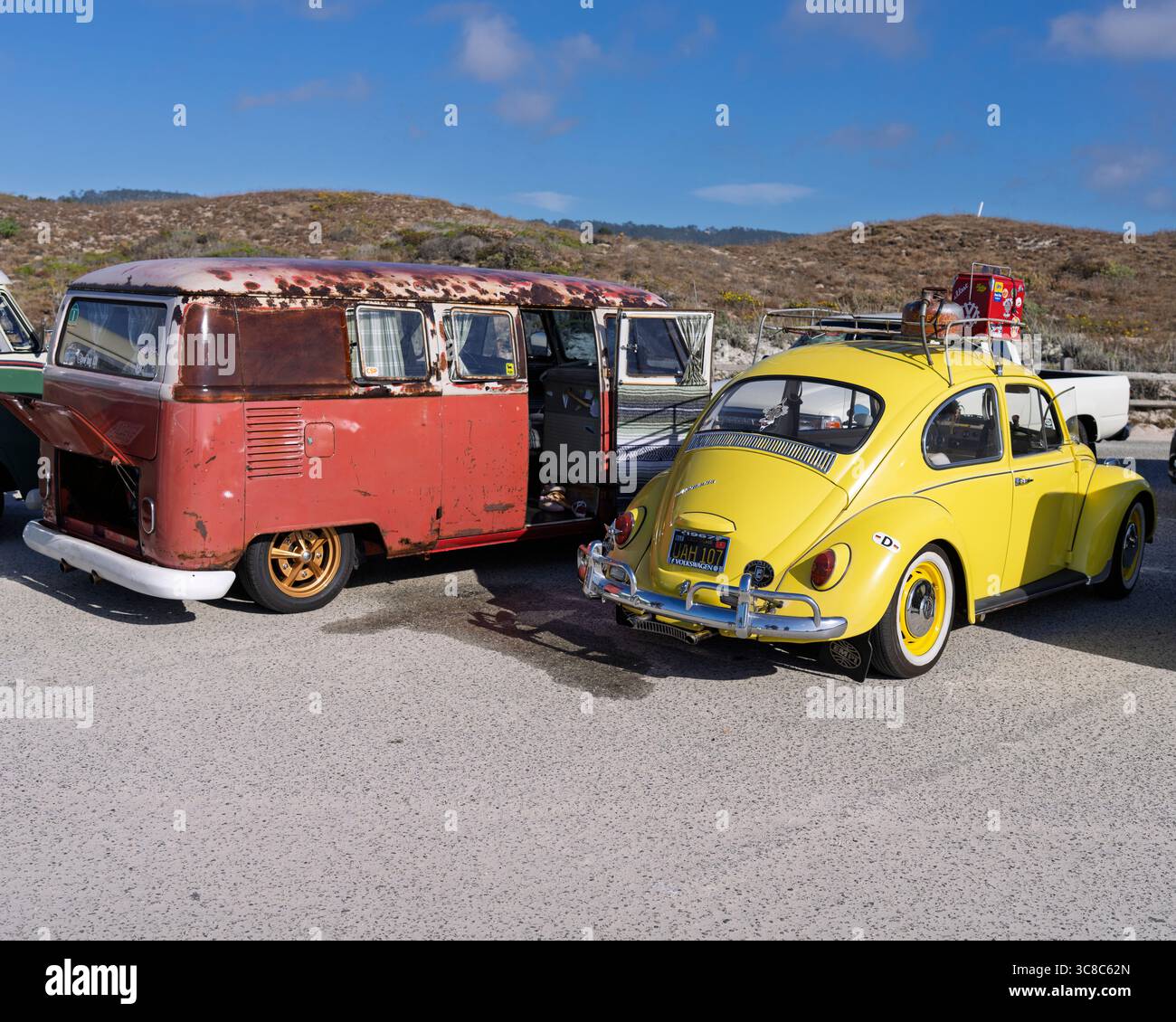 Vintage Volkswagen Beetle and Rusty Bus at Coastal Car Meet Stock Photo ...