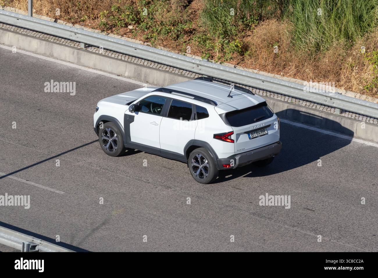 Modern white dacia jogger car driving on the highway on a sunny day ...