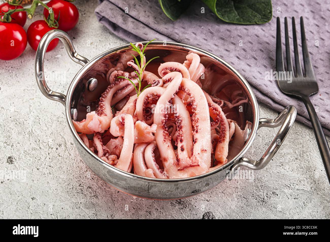Marinated squid tentacles in the bowl for snack or salad Stock Photo ...