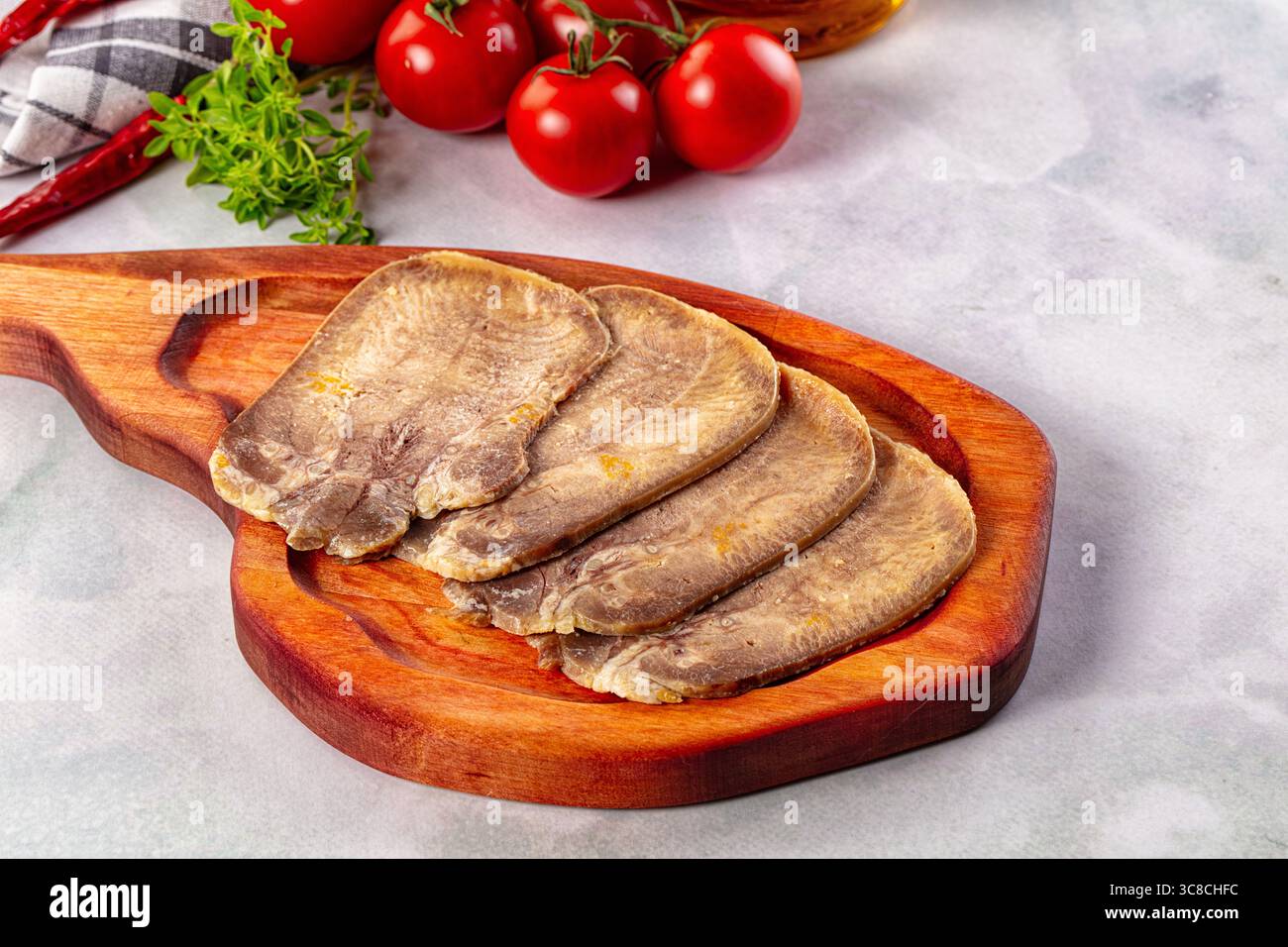 Boiled beef tomgue slices appetizer snack Stock Photo - Alamy