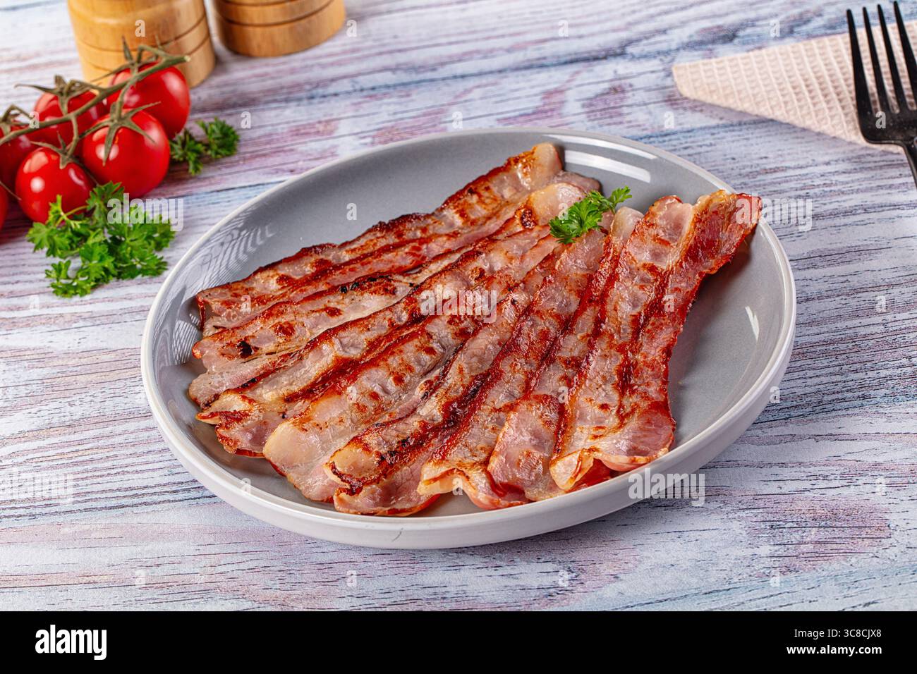 Fried fat pork bacon for breakfast Stock Photo - Alamy