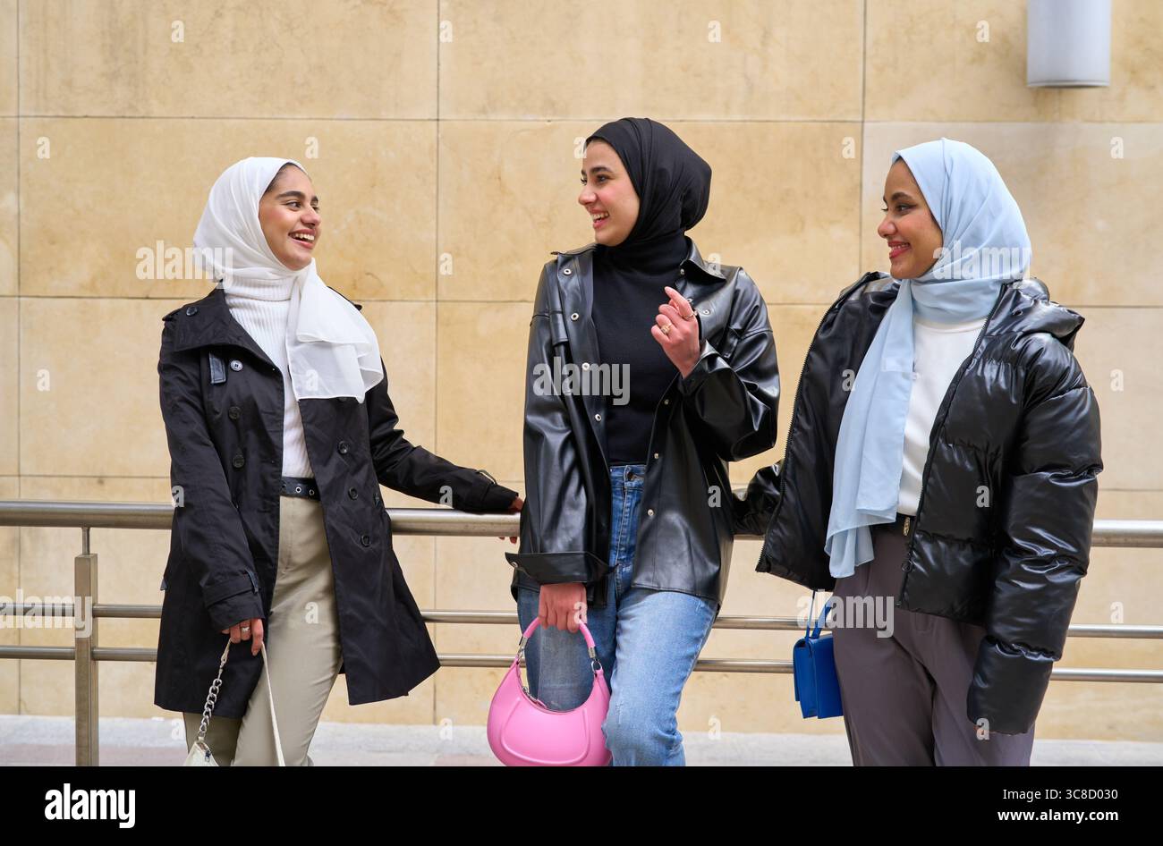 Group happy smiling muslim hi-res stock photography and images - Alamy