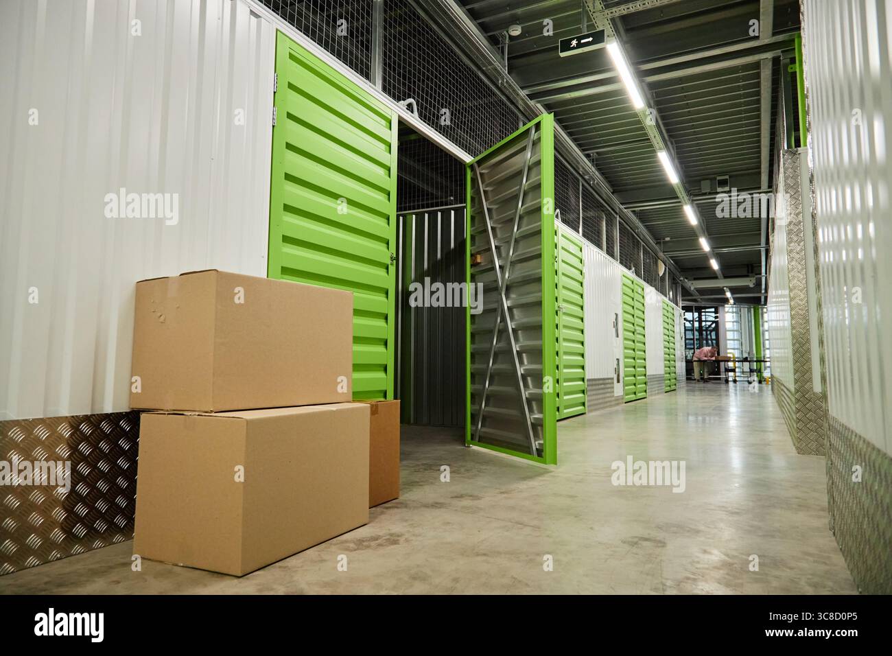 Cardboard Boxes Standing in Modern Self Storage Facility Corridor Stock ...