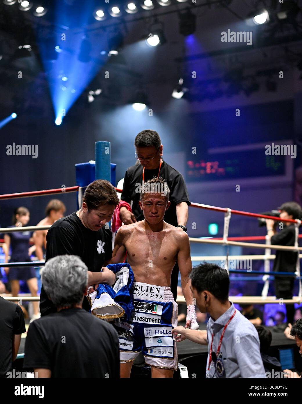 Challenger Shigetoshi Kotari looks dejected after the draw the OPBF Super Featherweight title ...