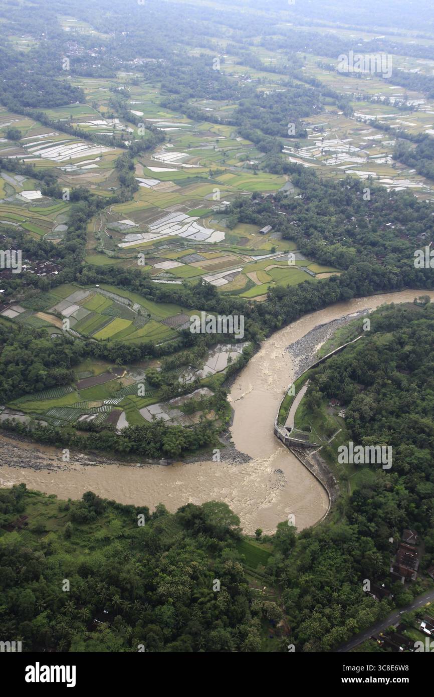 Kali Progo River that crosses through the fertile rice fields and ...