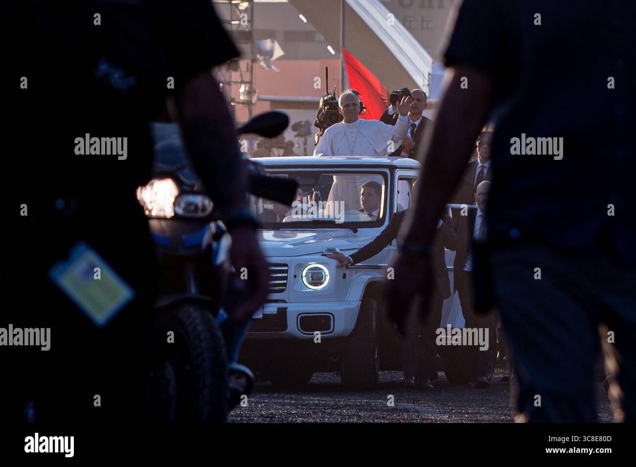 Pope Leo XIV greets the crowd in a papamobile as he arrives in Rome ...